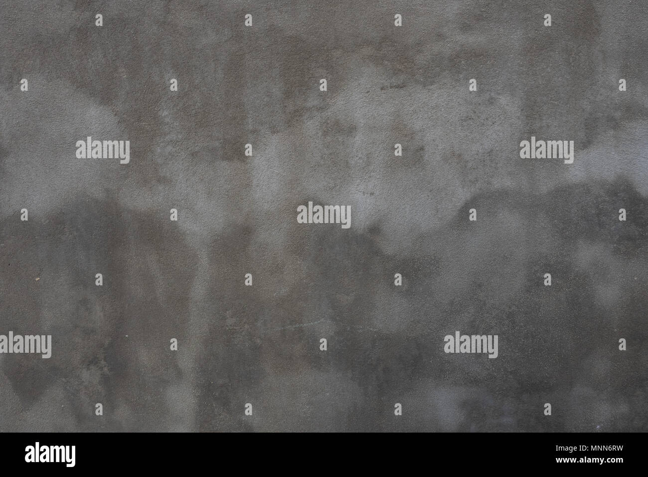 Abstract background texture of a wet old wall in gray, flooded with ...