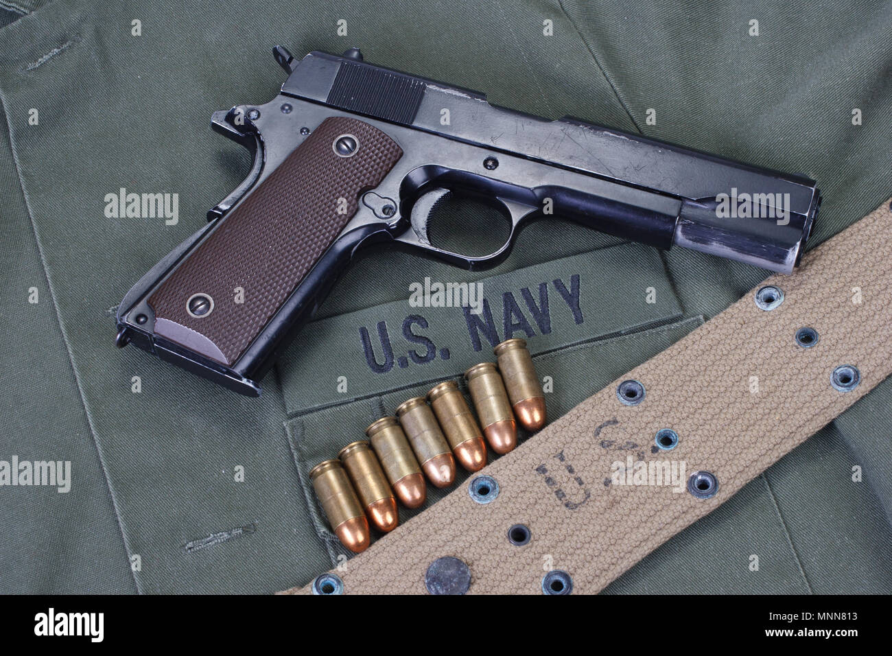 colt goverment m1911 with us navy uniform Stock Photo - Alamy