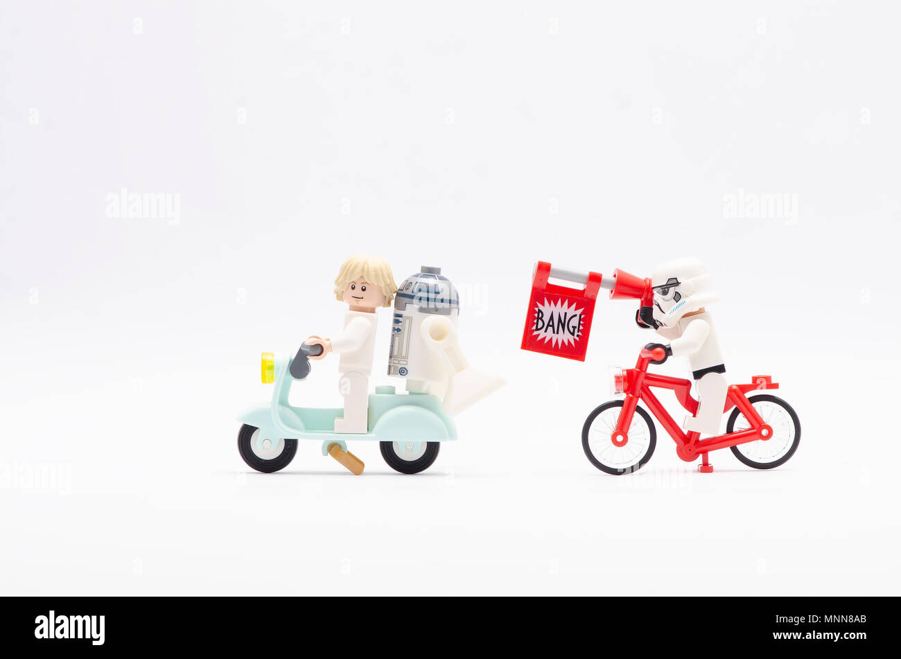 mini figure of storm trooper riding bicycle chasing luke skywalker and ...