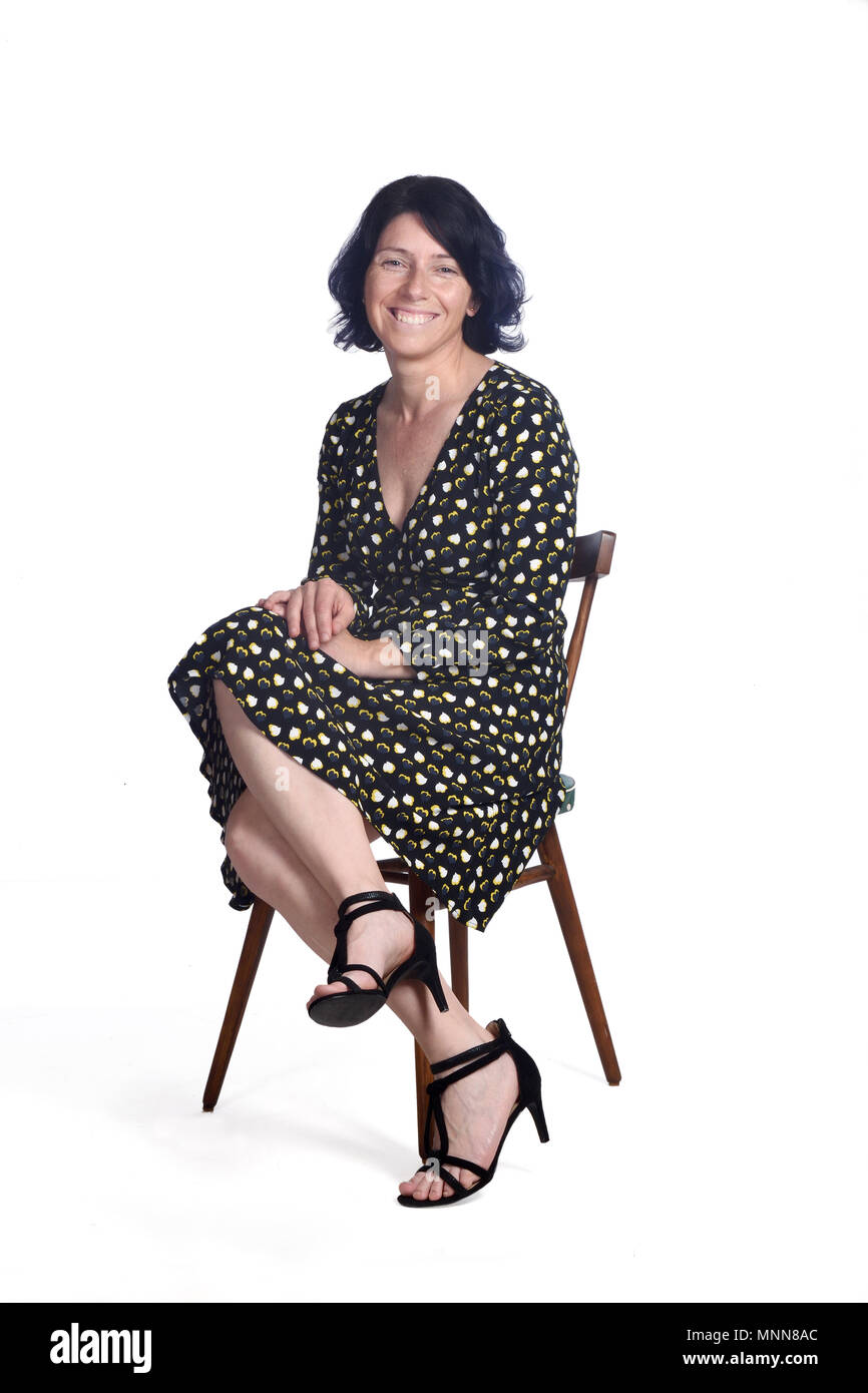 full portrait of a sitting woman on white Stock Photo - Alamy