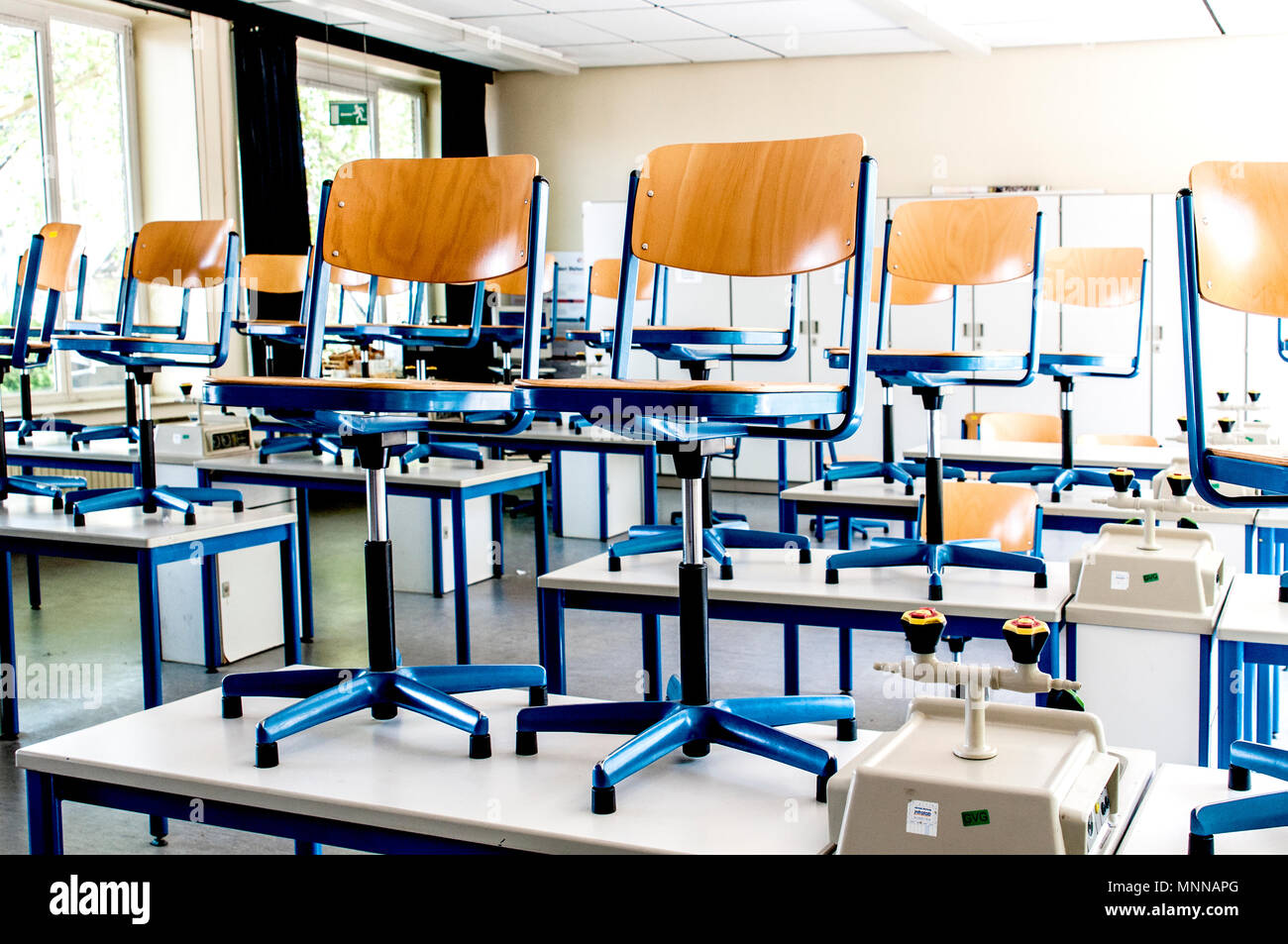 Classroom for chemistry with tables and chairs; Klassenraum für chemie ...