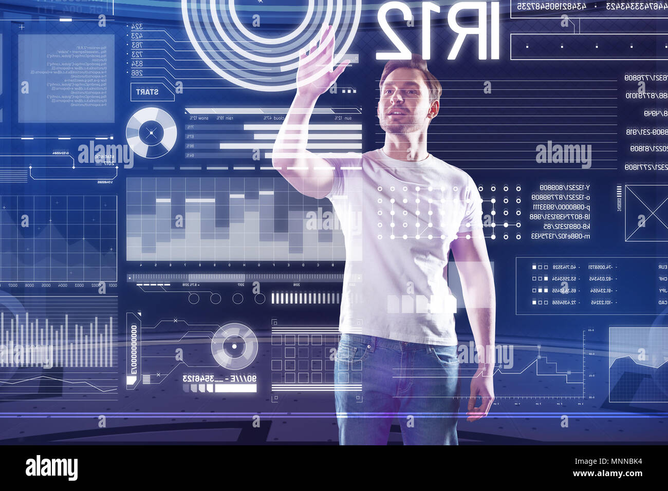 Enthusiastic software developer putting his hand up while working Stock Photo - Alamy