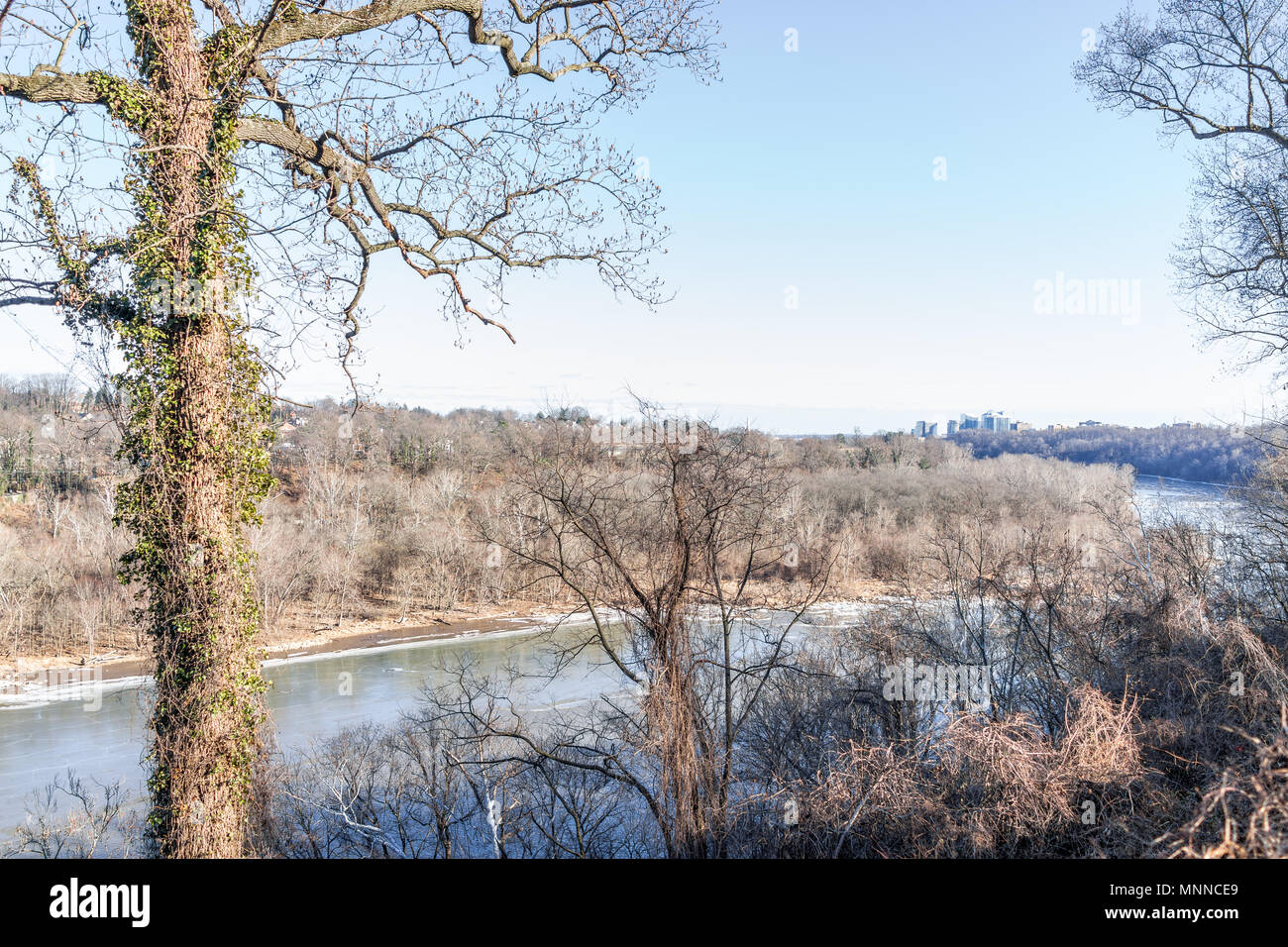 Overlook of Potomac River frozen surface in winter landscape, bare ...