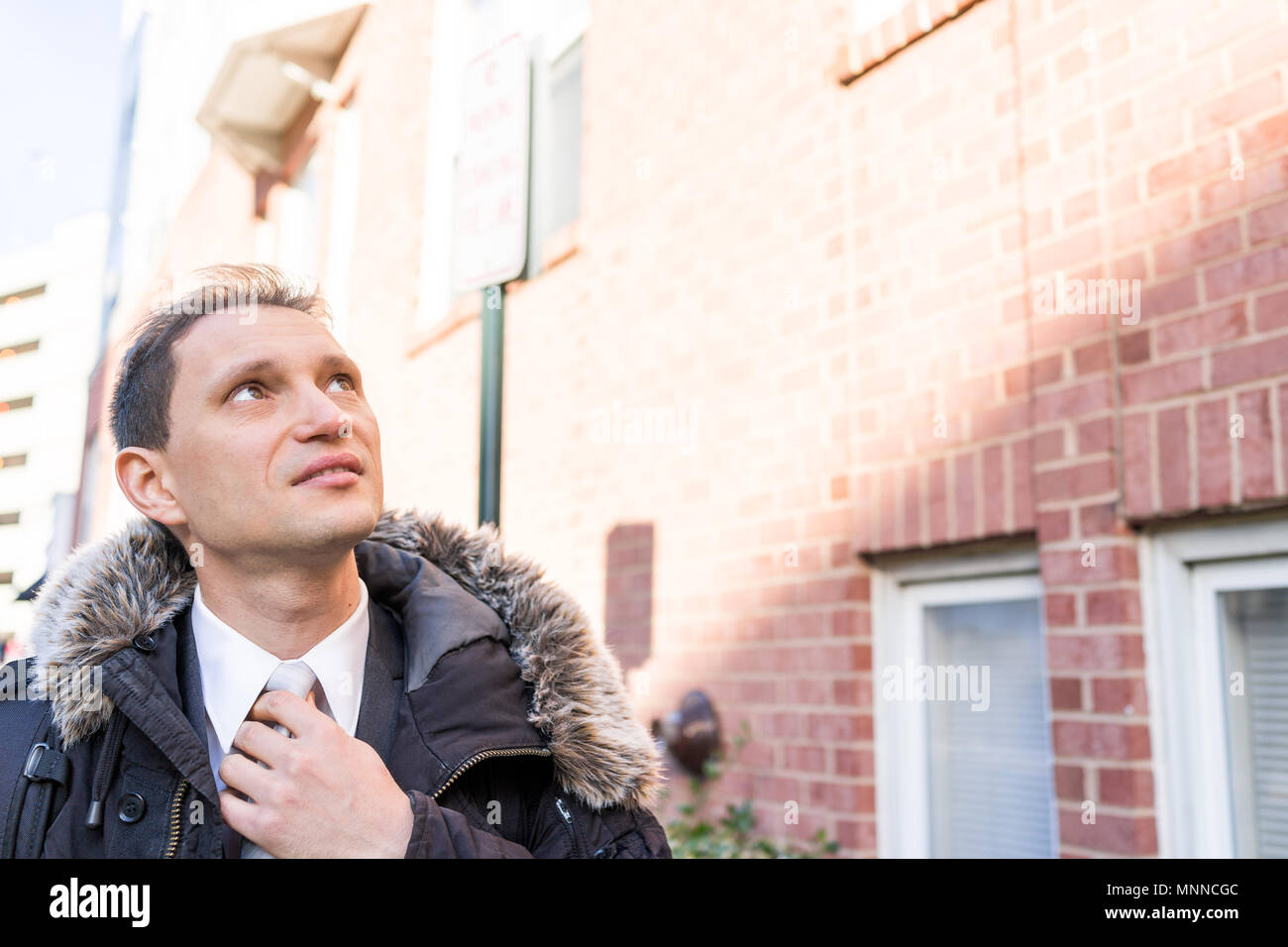 Handsome, attractive young serious happy businessman closeup face ...