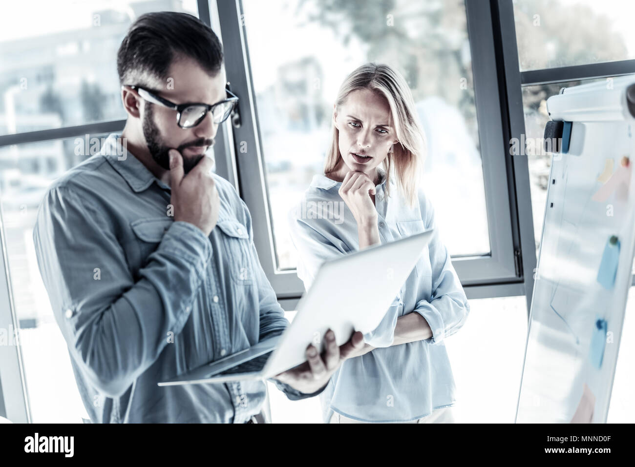 Businesspeople using digital gadgets hi-res stock photography and ...