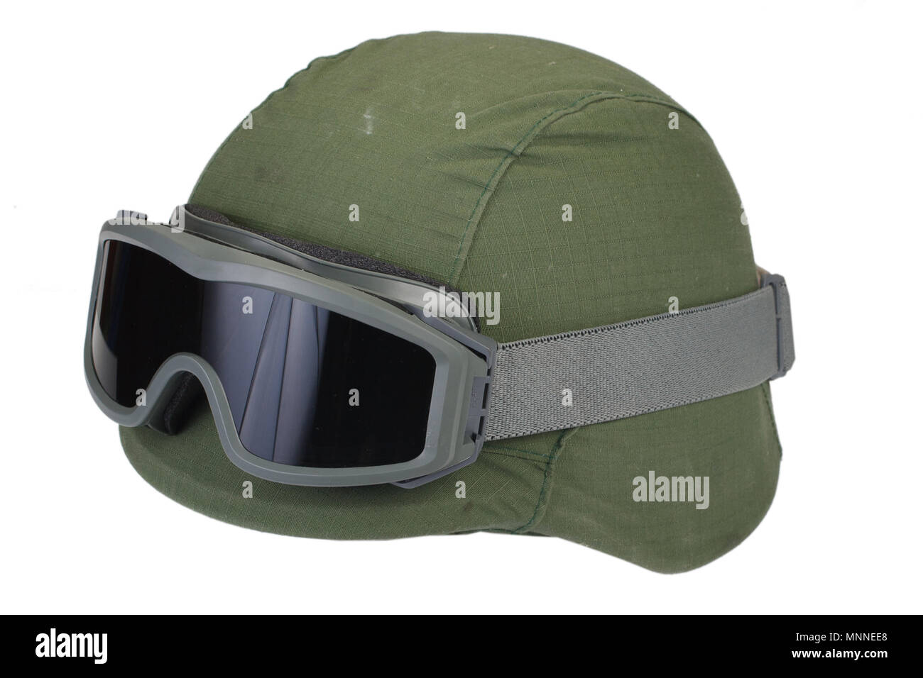 kevlar helmet with a camouflage cover and protective goggles isolated ...