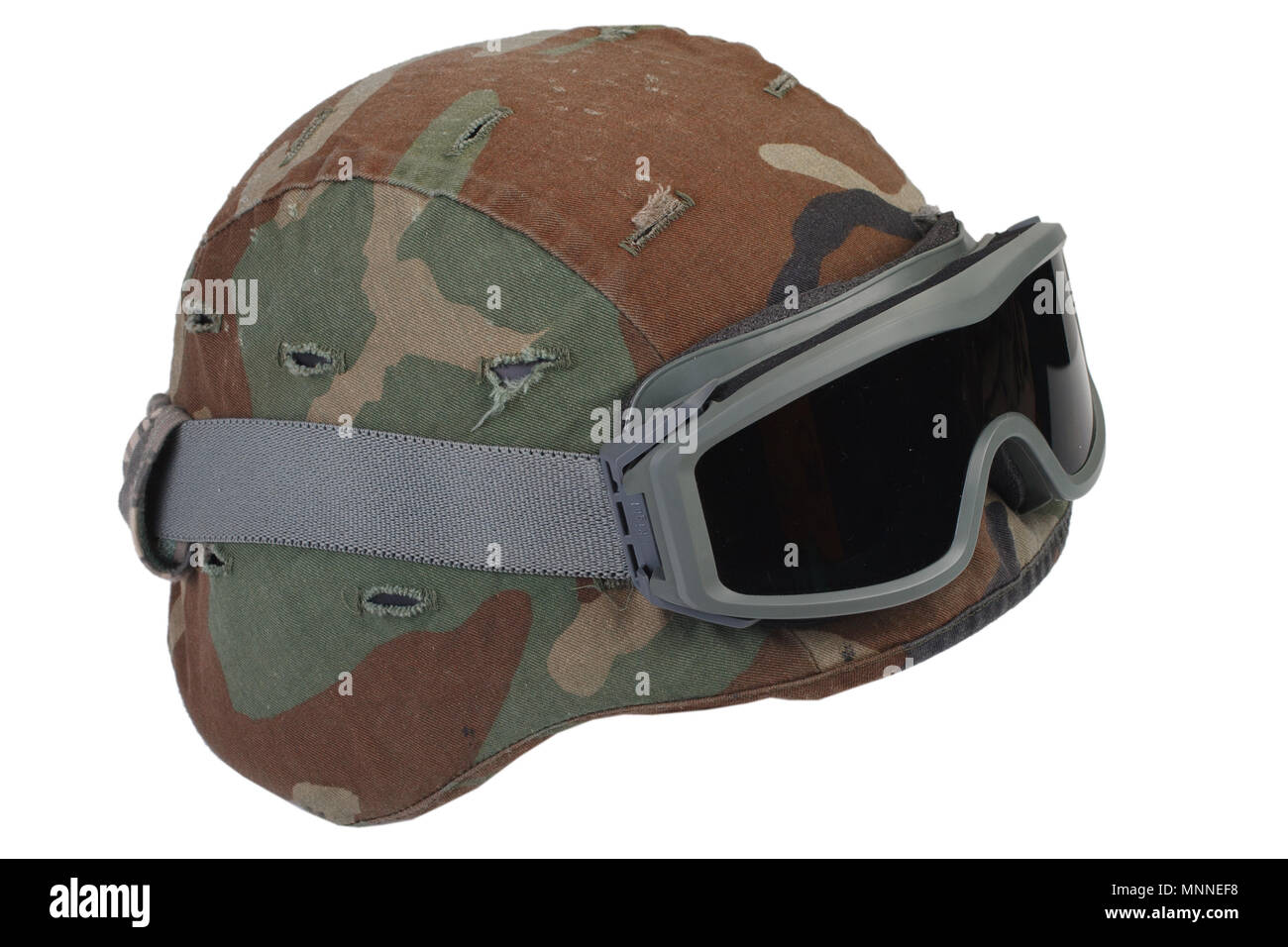 kevlar helmet with a camouflage cover and protective goggles isolated ...