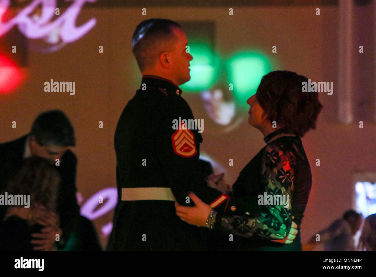 U.S. Marine Staff Sgt. Brian D. Raney and Raven Campbell dance at St ...
