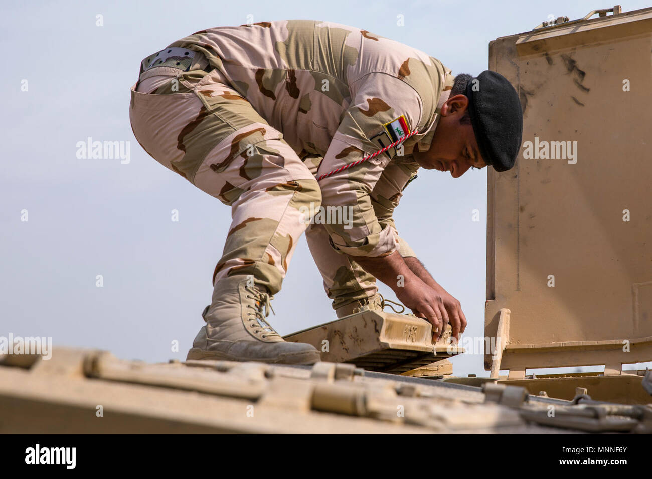 An Iraqi soldier, with the Iraqi Army 2nd Company, 1st Battalion, 34th ...