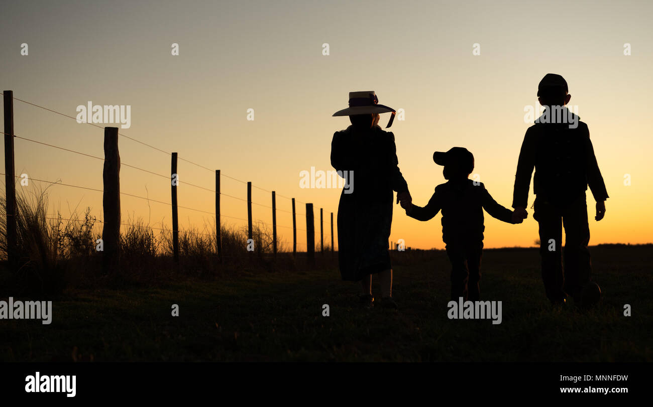 Mennonite children holding hands Stock Photo - Alamy