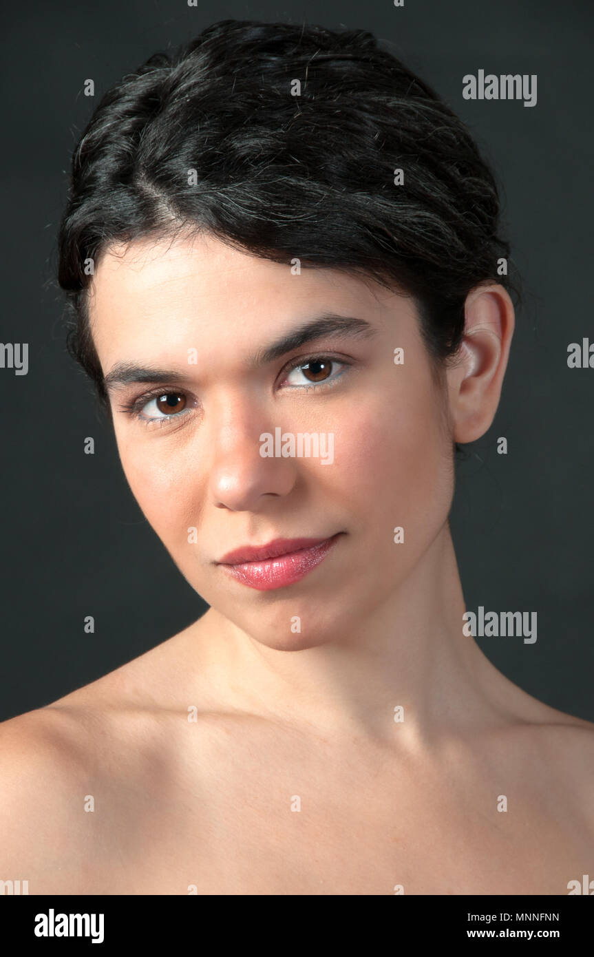 Serious woman waiting for an answer Stock Photo - Alamy