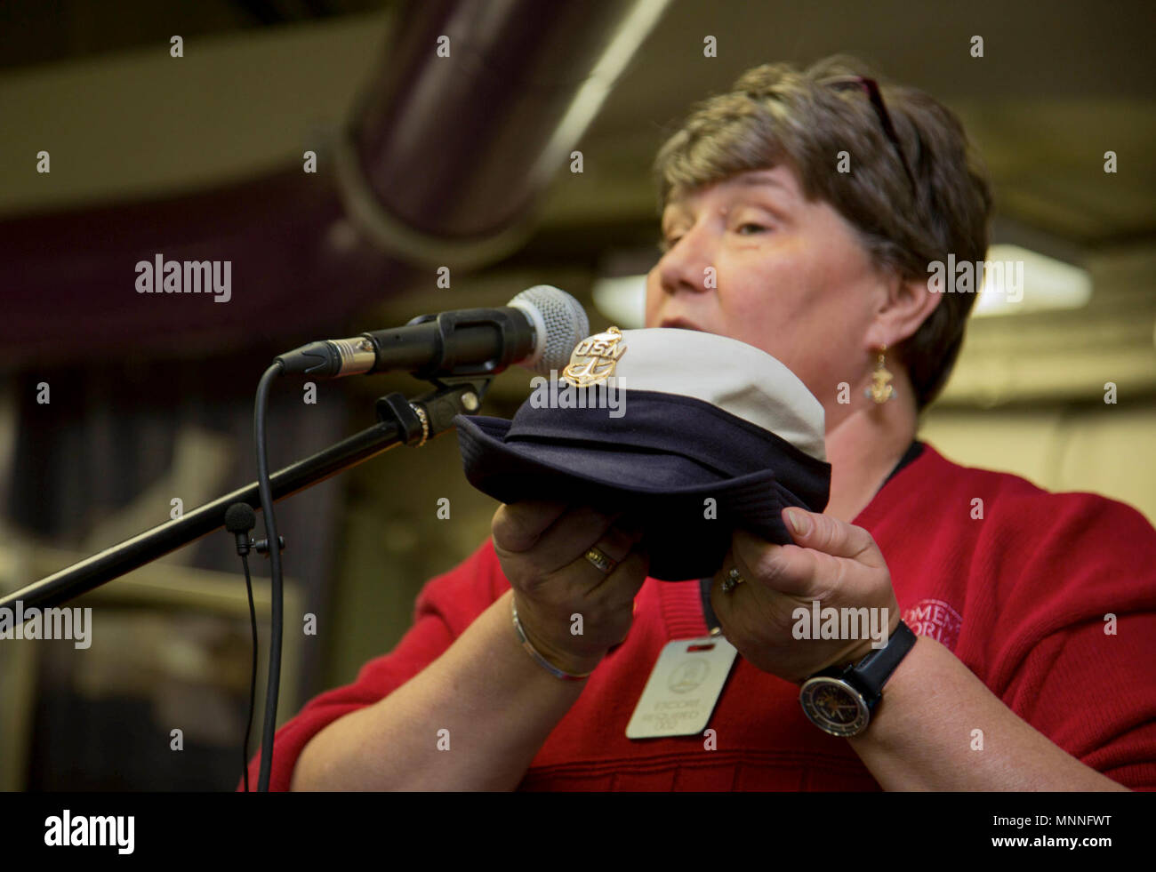 (March 12, 2018) April Maletz, a retired senior chief yeoman, displays ...