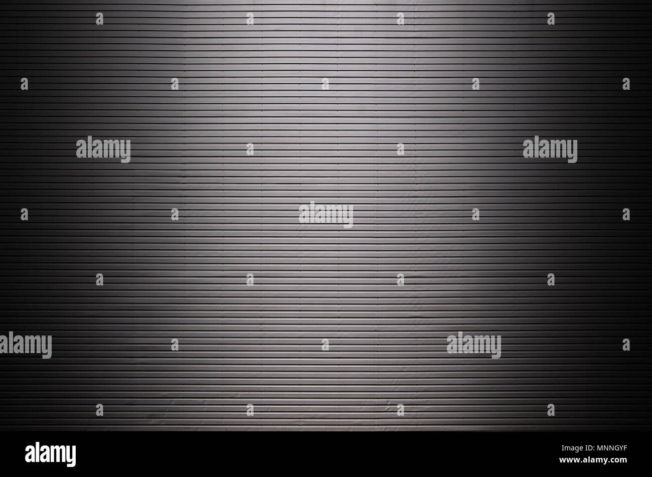 The texture of a metal wall or a surface of corrugated metal with ...