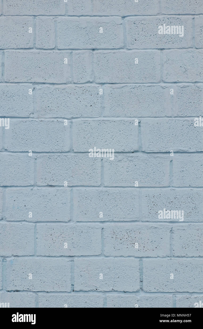 Weathered stained old colored blue block wall background. Texture of an ...