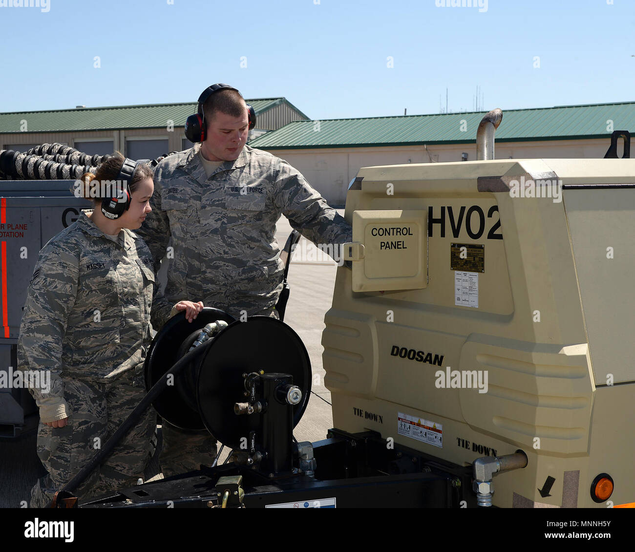 U.S. Air Force Senior Airman Samantha M. Massey and Staff Sgt. Keith C ...