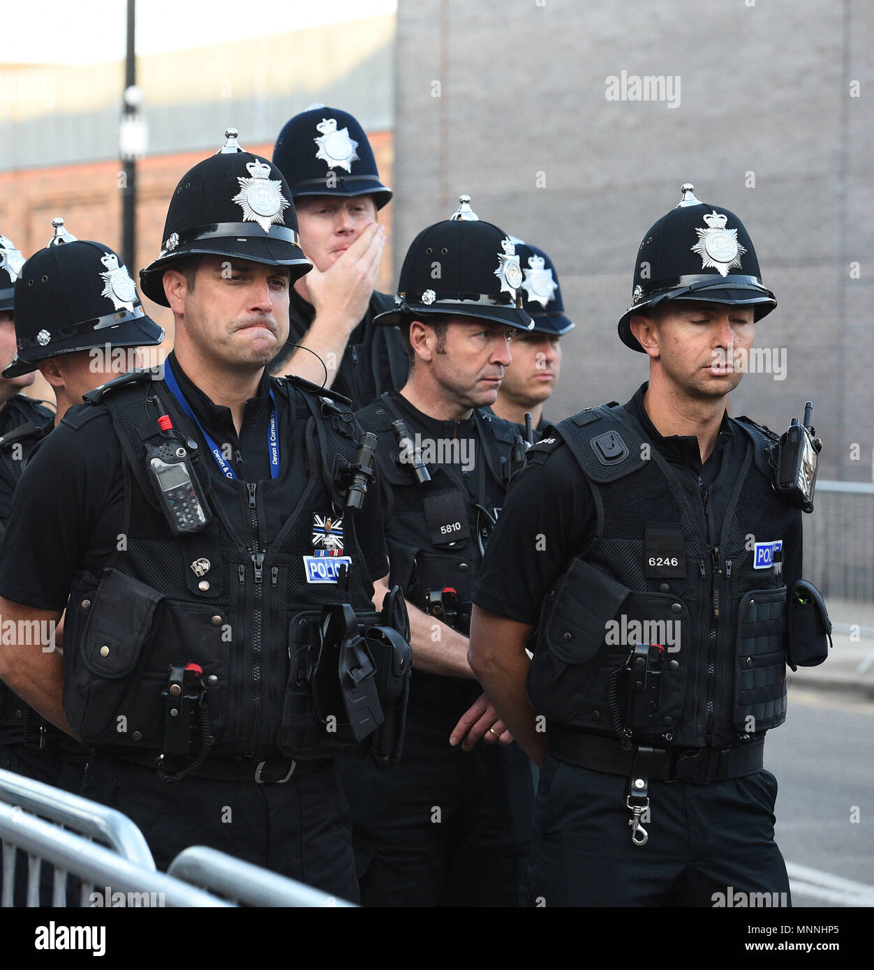Police officers gather outside Victoria Barracks ahead of the wedding ...