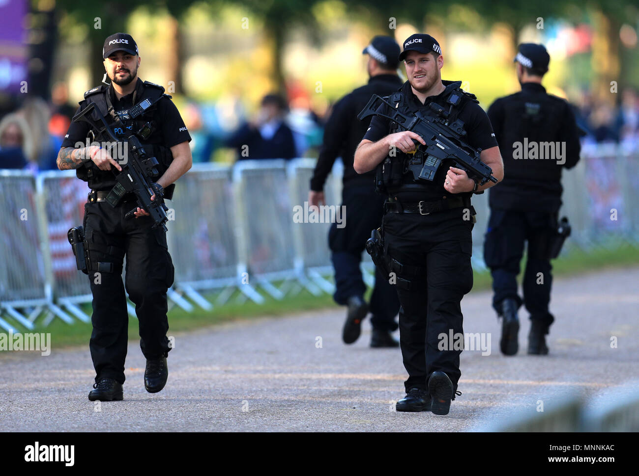 Armed police ahead of the wedding of Prince Harry and Meghan Markle in ...