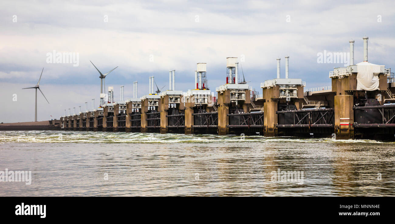 Flood protection in the Netherlands and wind turbines Stock Photo - Alamy