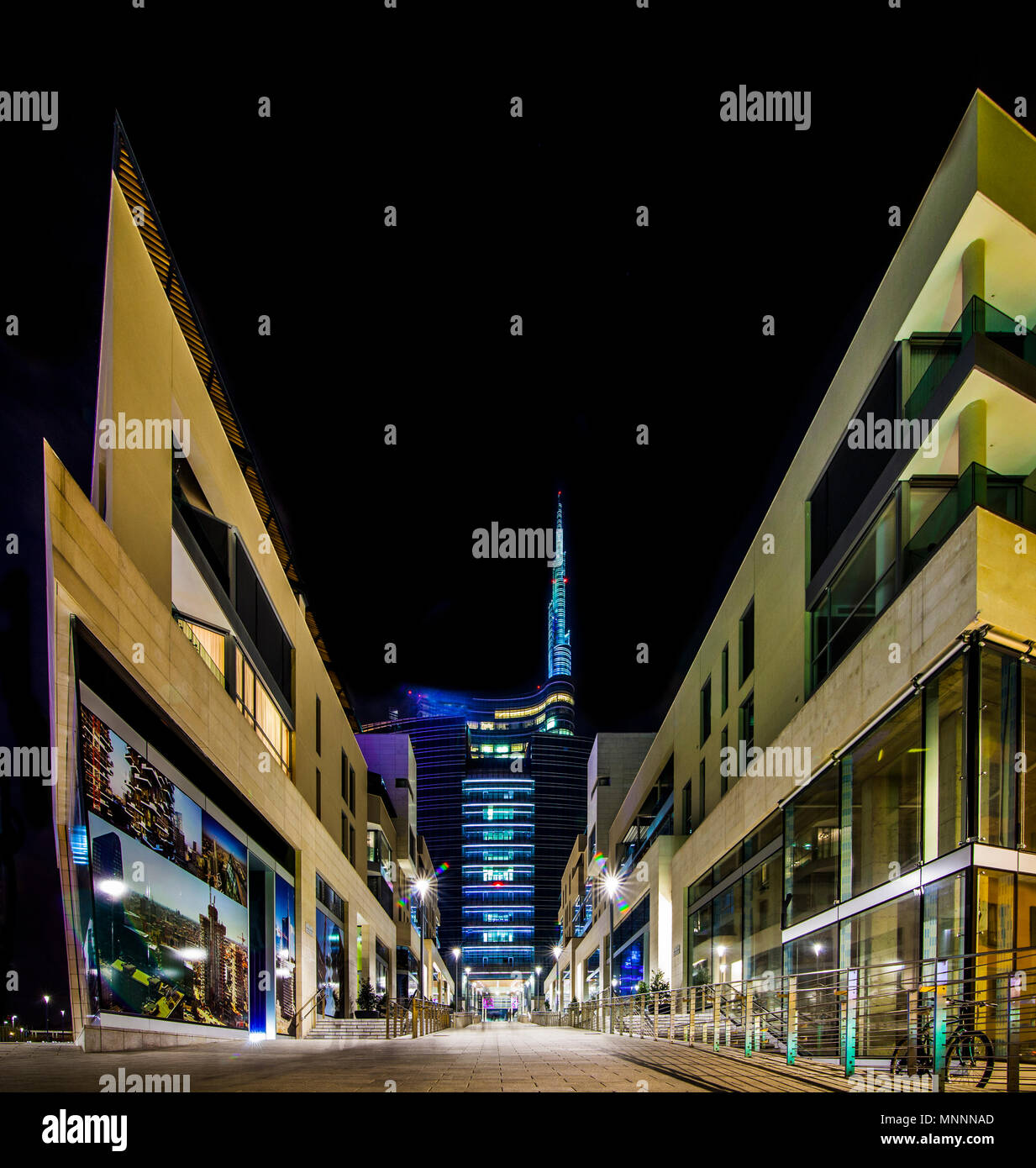 modern street in Milan by night Stock Photo - Alamy