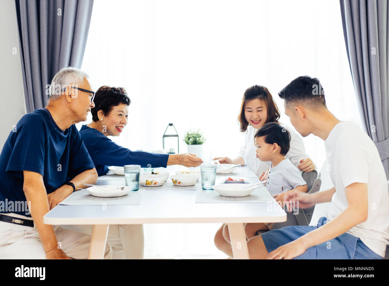 Chinese girl family dinner hi-res stock photography and images - Alamy