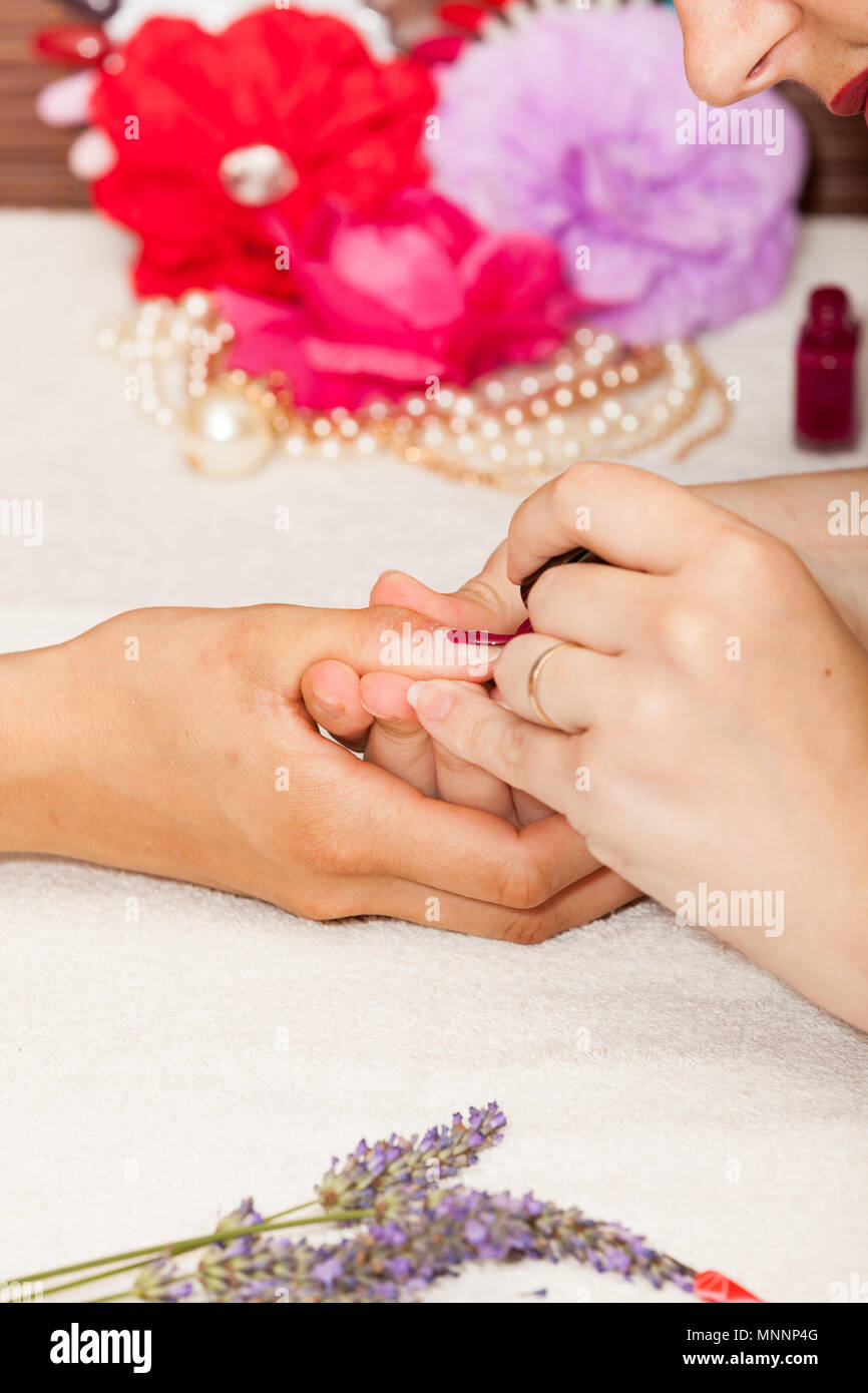Womans hands applying hand hi-res stock photography and images - Alamy
