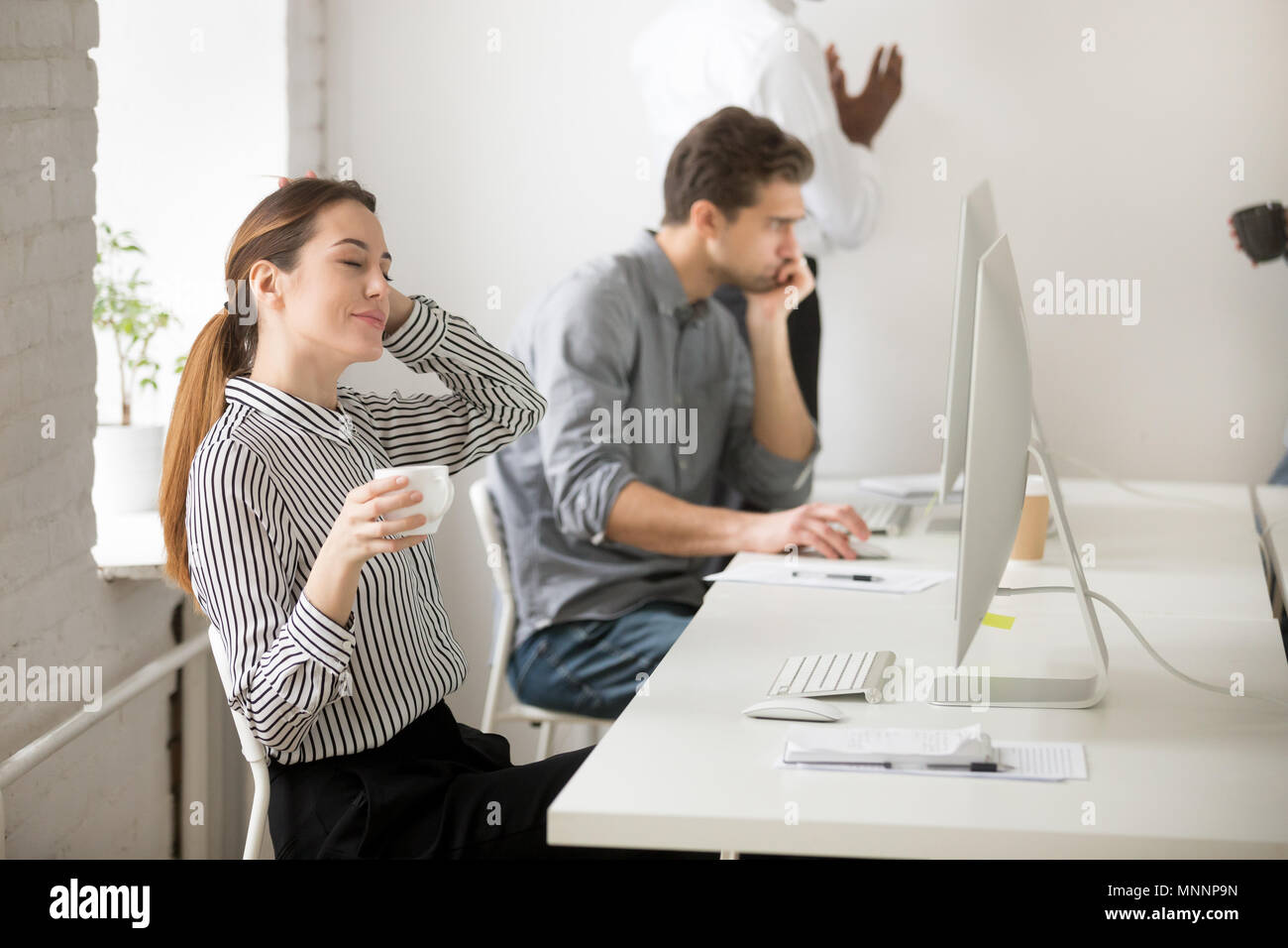 Beautiful businesswoman relaxing enjoying coffee break at work i Stock ...