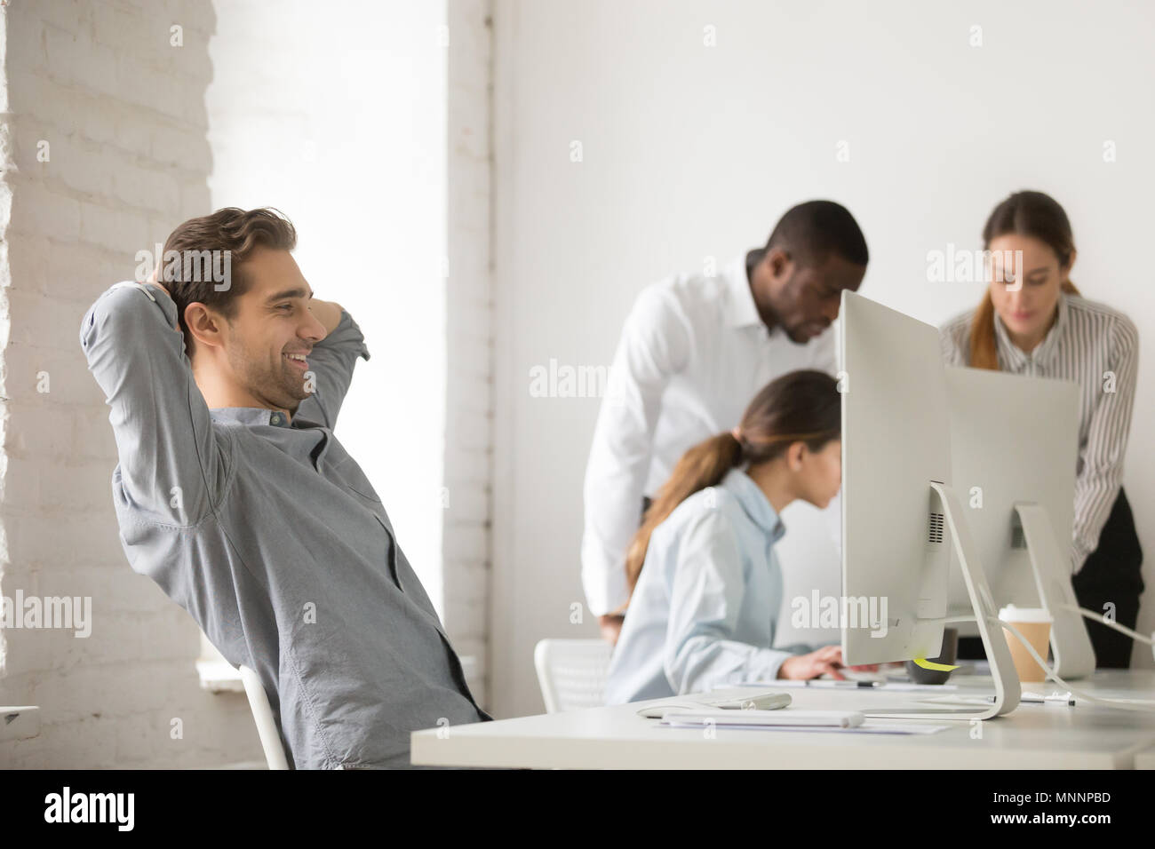 Happy businessman taking break for relax satisfied with computer Stock ...