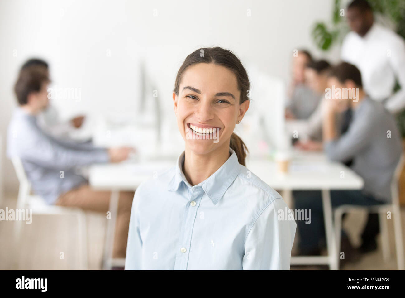 Cheerful happy girl intern laughing looking at camera, headshot Stock ...