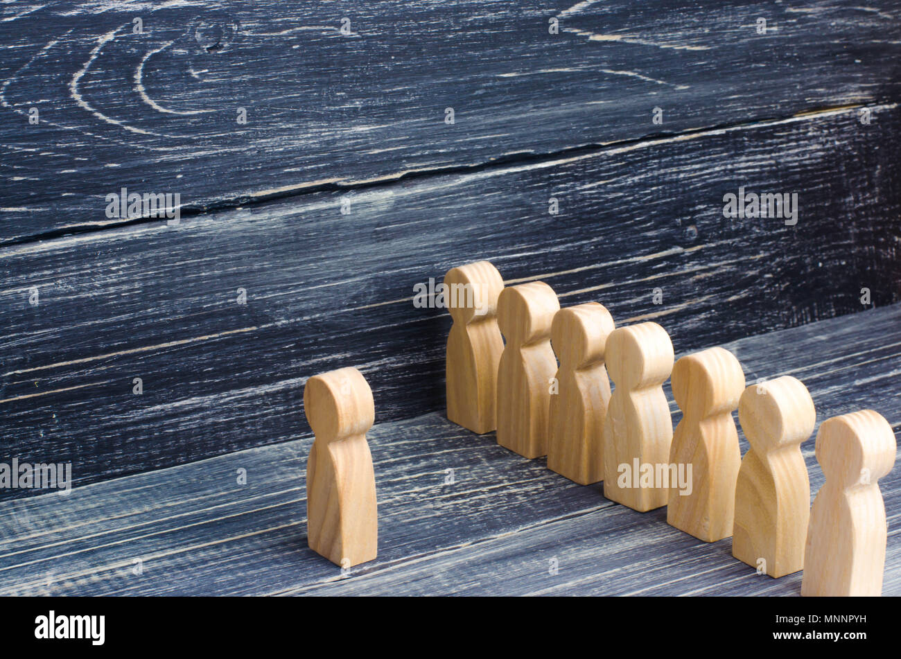 People stand in line at the briefing and wait for orders. Wooden ...