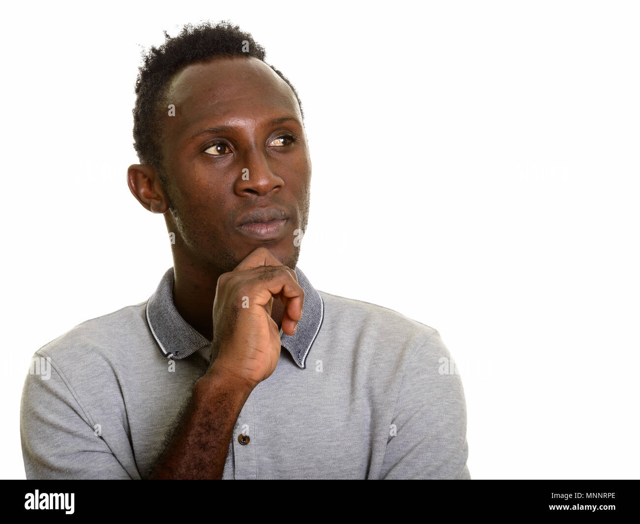 Young serious african man looking hi-res stock photography and images ...