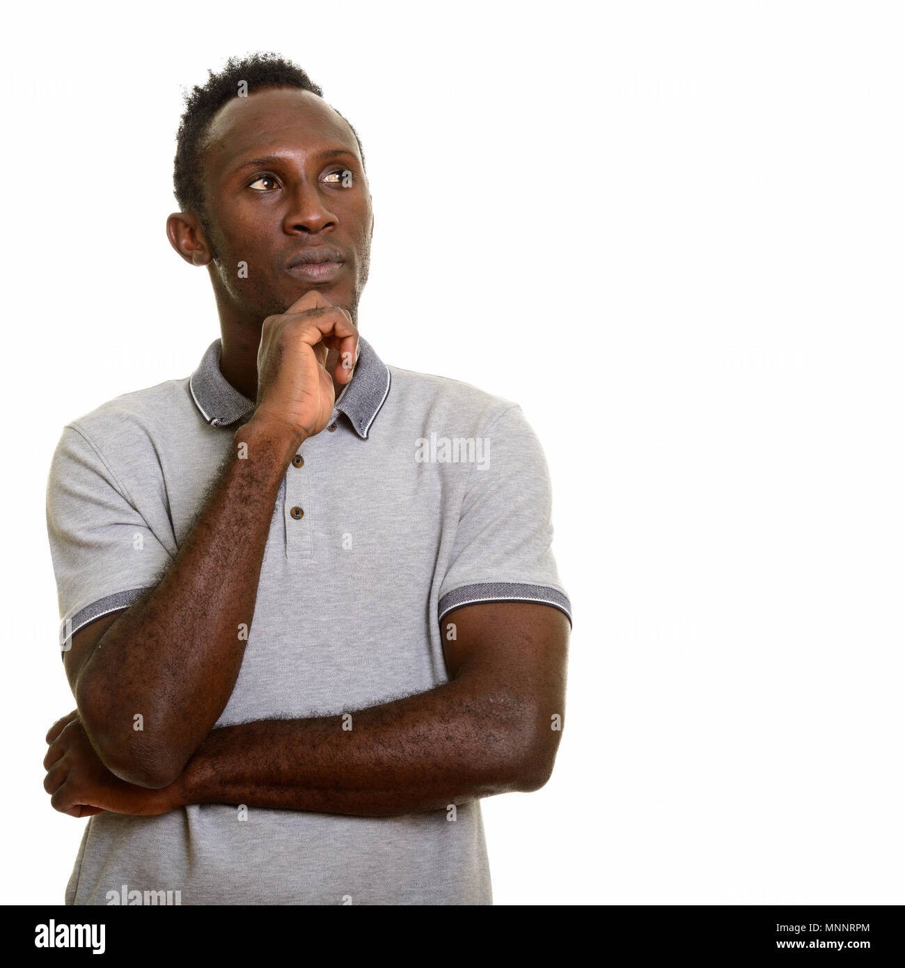 Young black African man thinking Stock Photo - Alamy