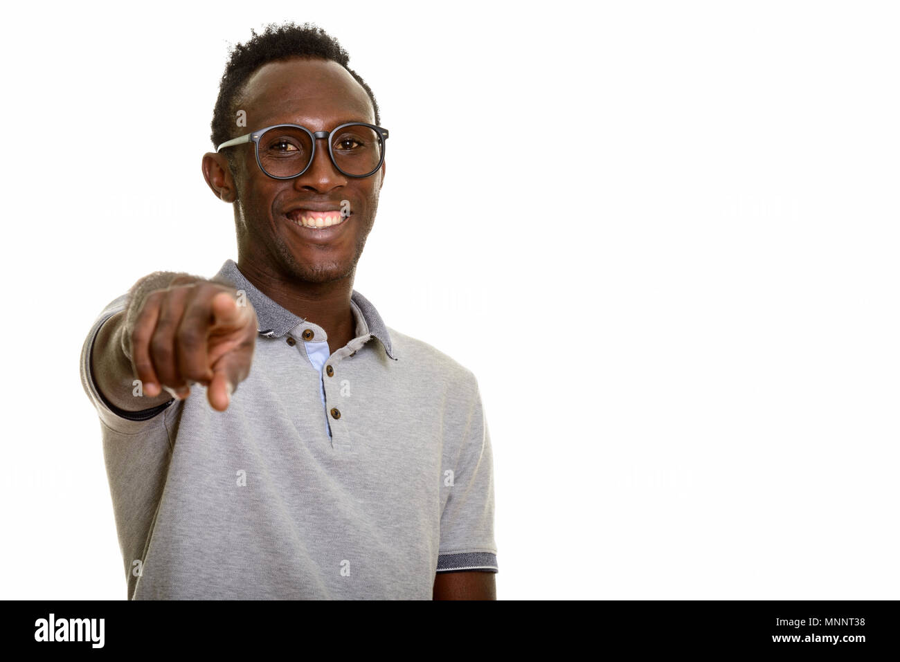 Young happy black African man smiling and pointing at camera Stock ...