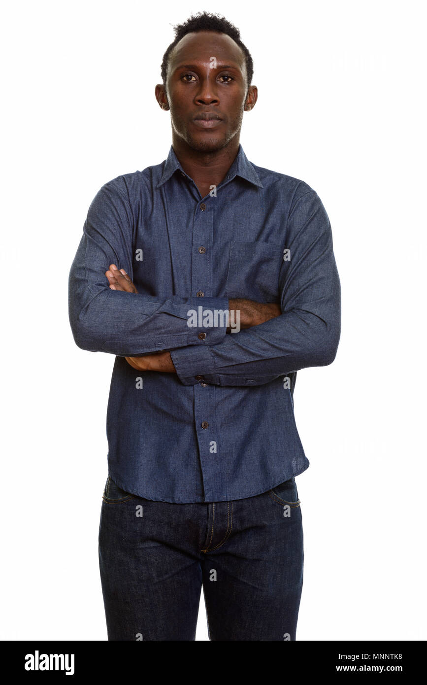 Young black African man with arms crossed Stock Photo - Alamy