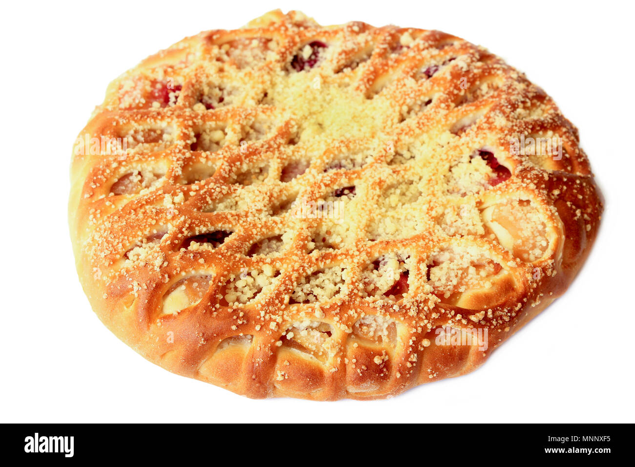 Sweet round cake filled with fruit and berries isolated on a white ...