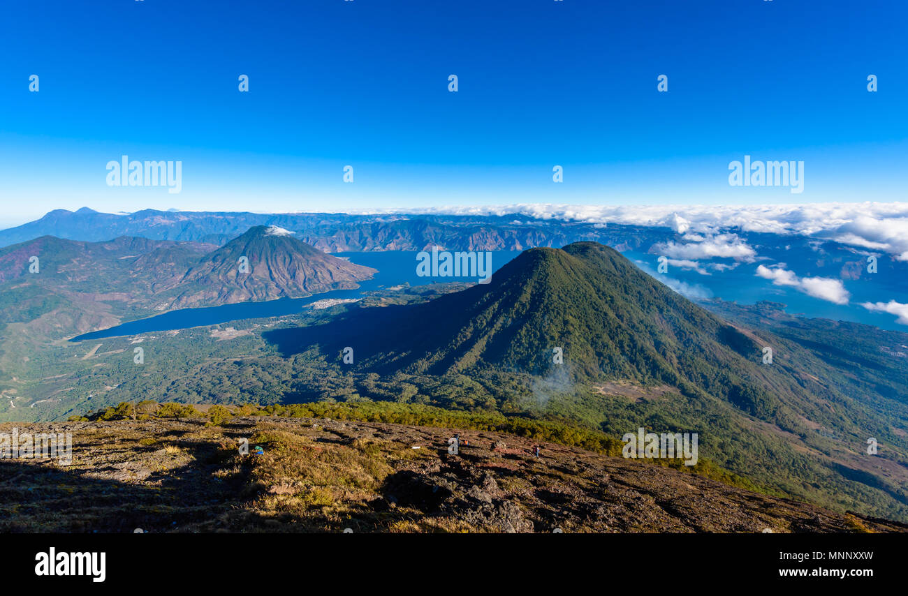Panorama view of Lake Atitlan and volcano San Pedro and Toliman early ...