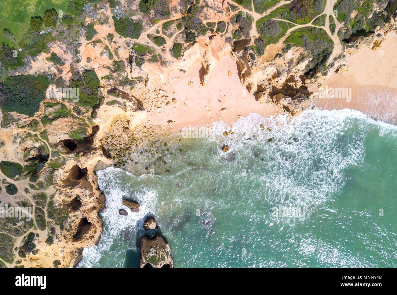 Aerial view of tropical sandy beach, cliffs and ocean Stock Photo - Alamy