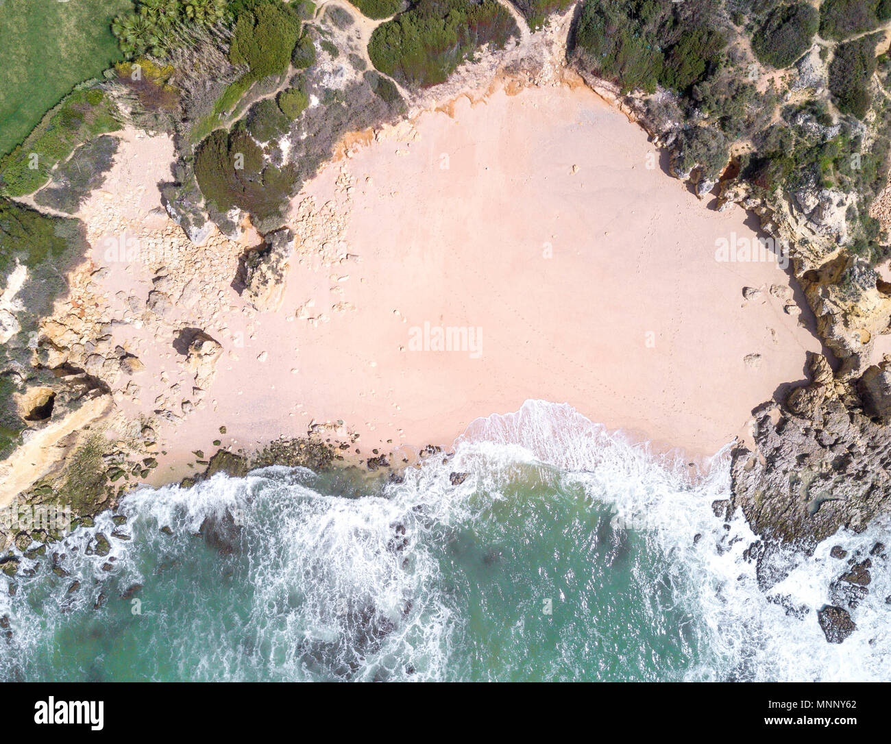 Aerial view of tropical sandy beach, cliffs and ocean Stock Photo - Alamy