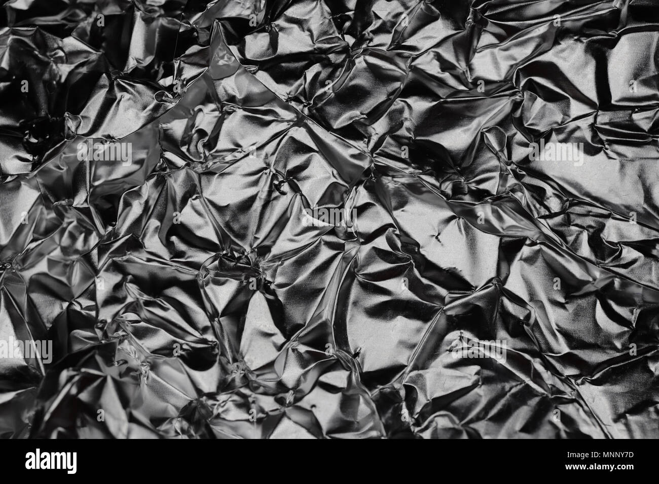 Crumpled aluminium foil hi-res stock photography and images - Alamy