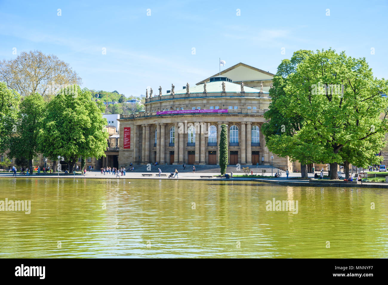 Stuttgart State Theatre Opera building and fountain in Eckensee lake ...