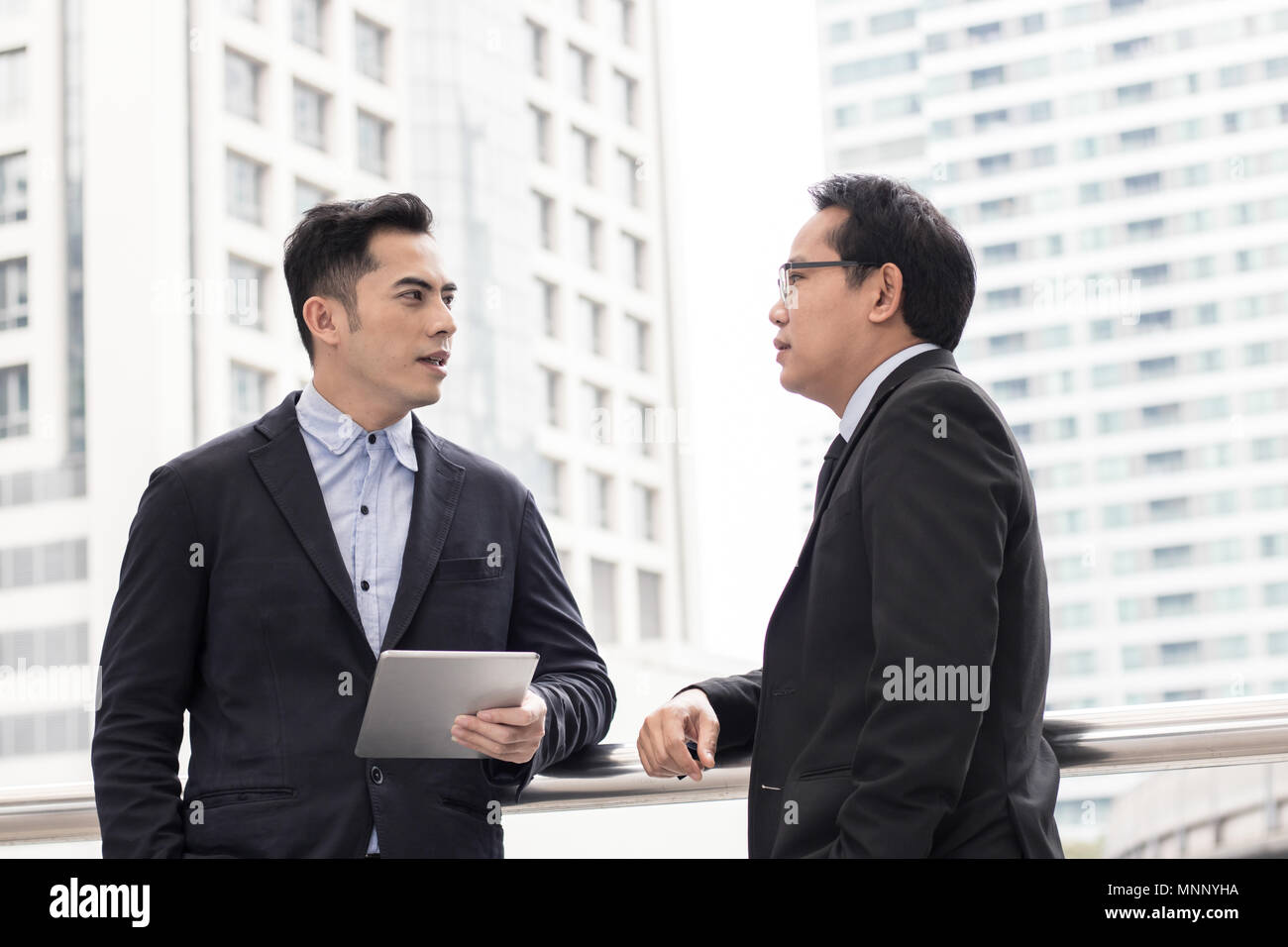 Businessman presenting work to boss, leader about planning project by ...