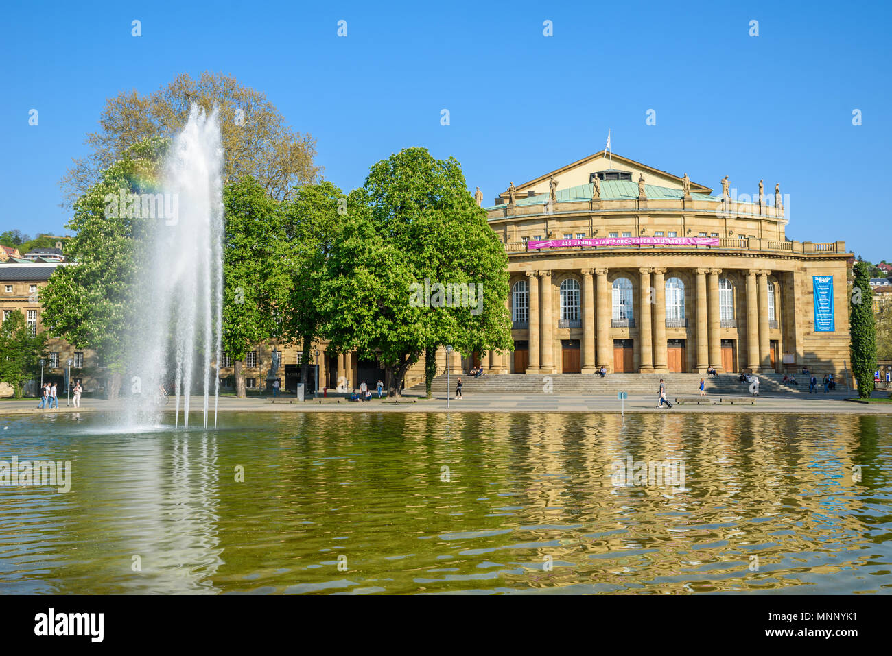 Stuttgart State Theatre Opera building and fountain in Eckensee lake ...