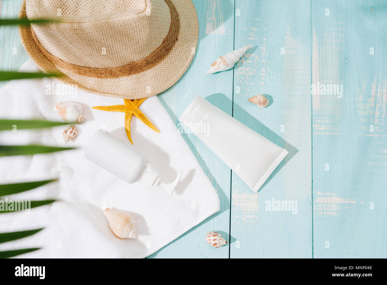 Tropical beach sunbathing accessories hi-res stock photography and ...