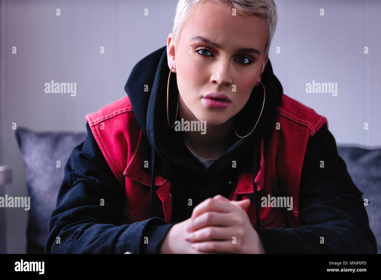 Portrait of young beautiful woman with short hairs - Influencer posing ...