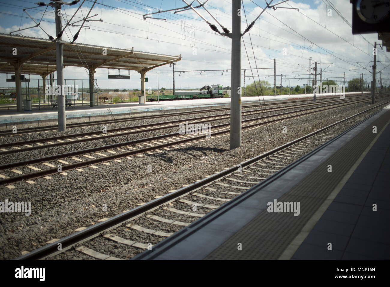 High speed modern electric train station platform tracks in Spain Stock ...