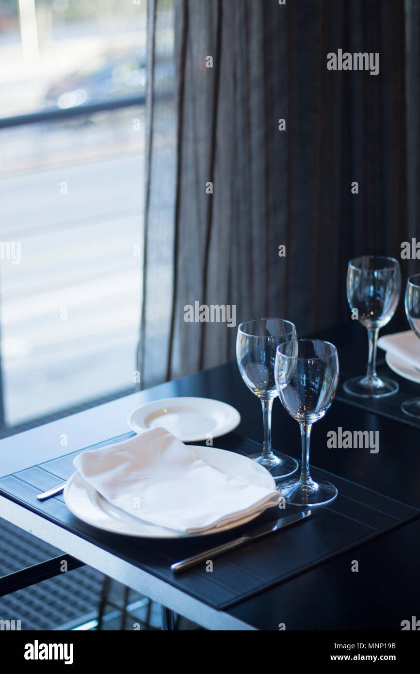 Restaurant cafe bar in luxury hotel with place settings for breakfast ...