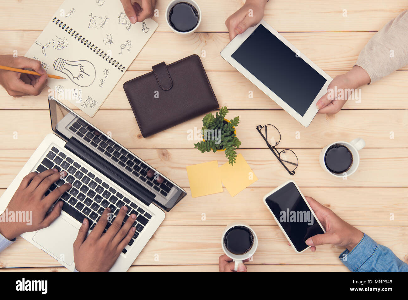 Business meeting top view. Business partners discussing project Stock ...