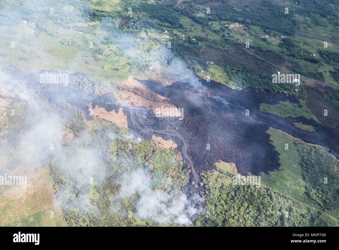 Hilo, Hawaii, USA. 18th May, 2018. An aerial view of lava escaping from ...