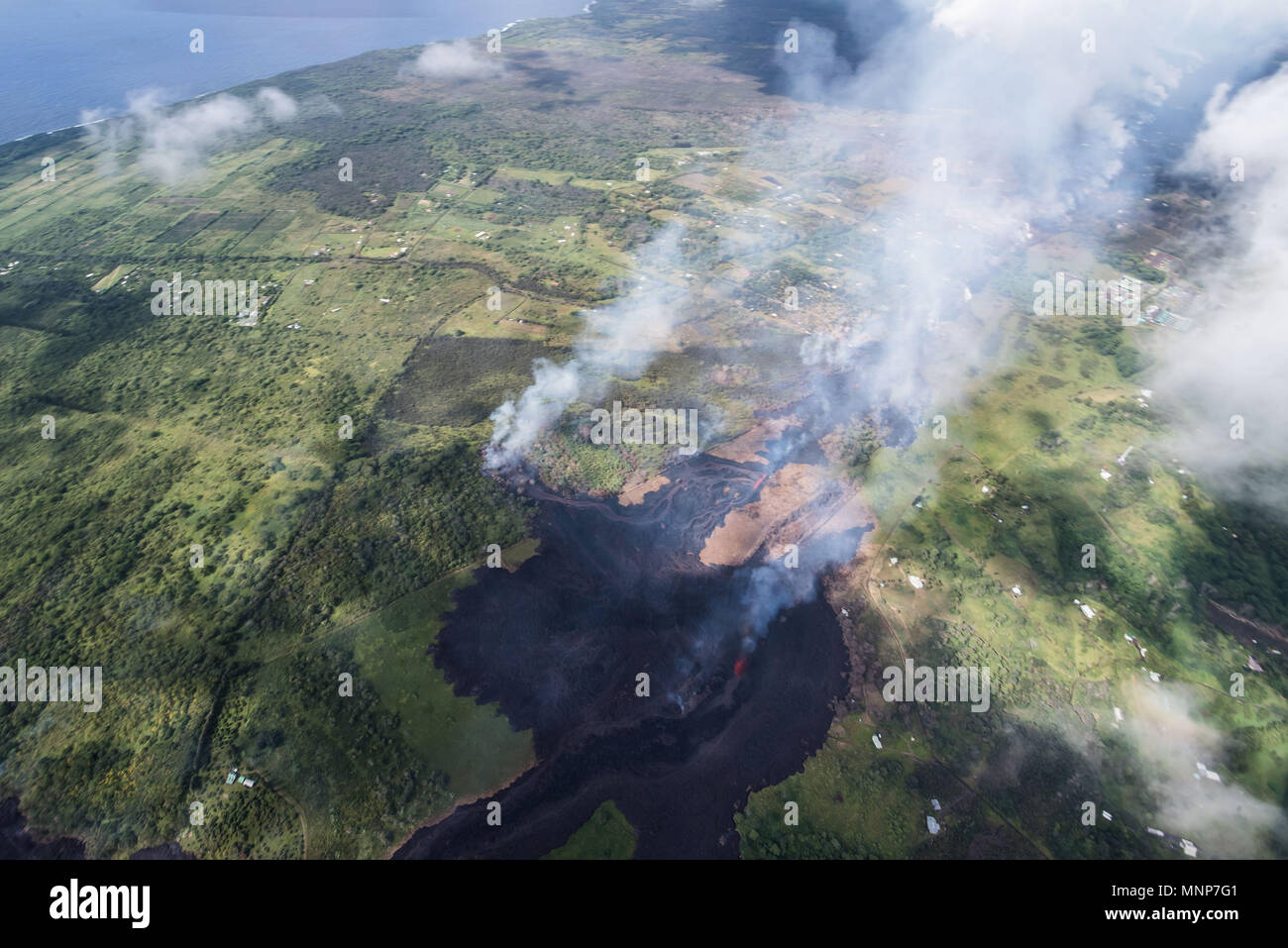 Hilo, Hawaii, USA. 18th May, 2018. An aerial view of lava escaping from ...