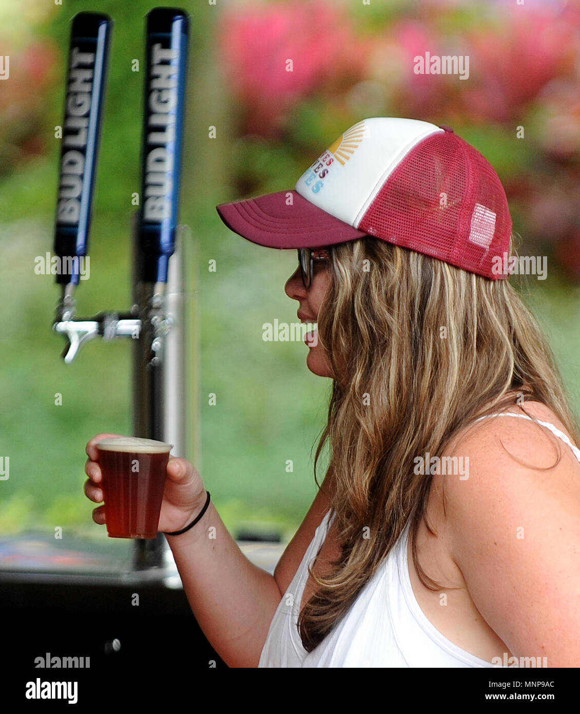 Orlando, Florida, USA. 18th May, 2018. A woman holds a complimentary ...
