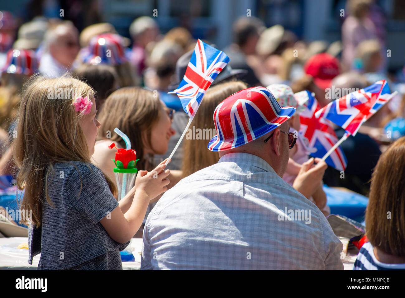 Union Jack flags and hats make a big showing as royalists gather at a ...